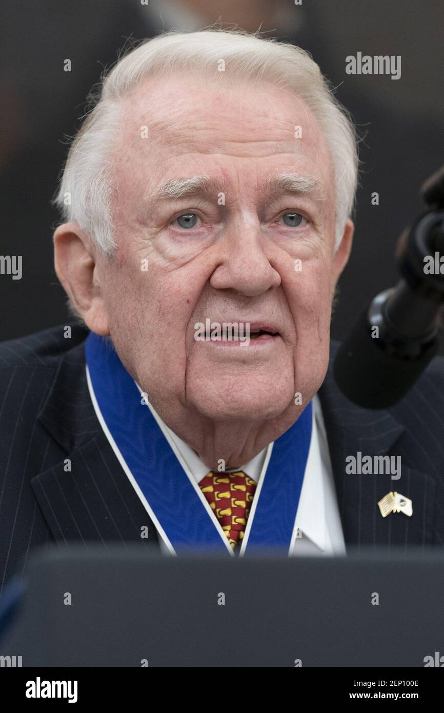 Edwin Meese listens during the ceremony in which United States ...