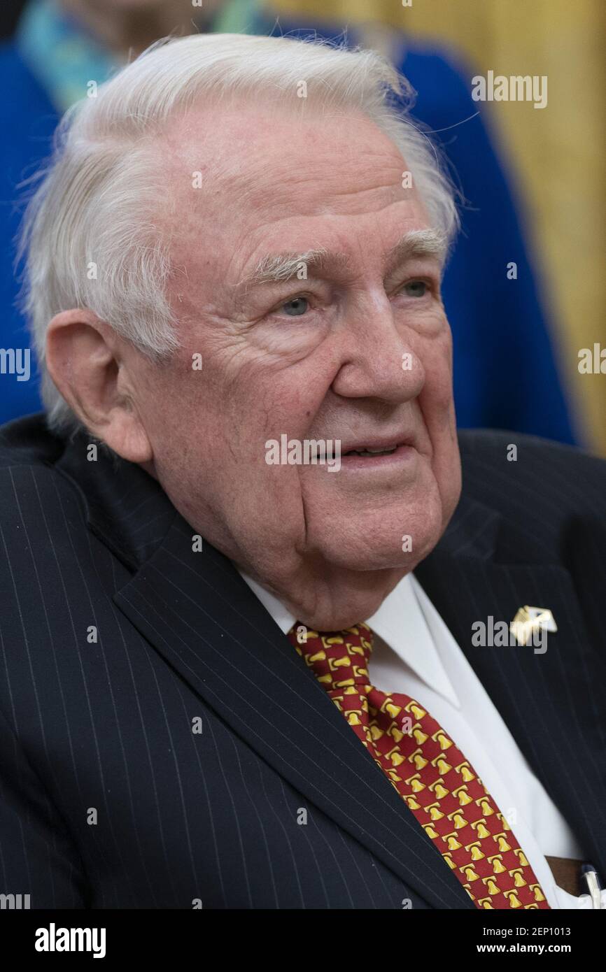 Edwin Meese listens during the ceremony in which United States ...