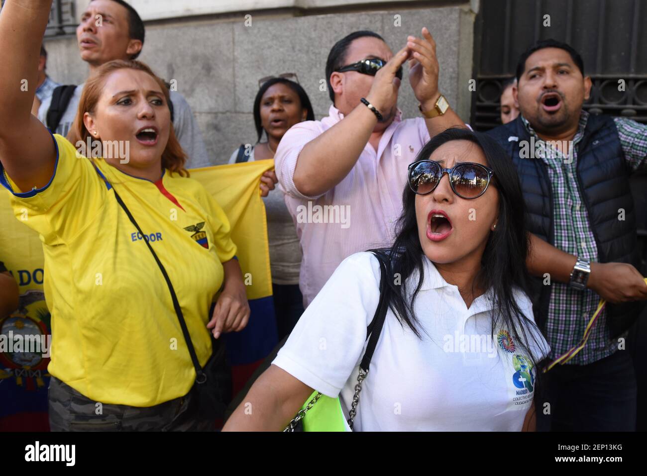 Protesters shout slogans during the demonstration. Ecuadorian nationals ...