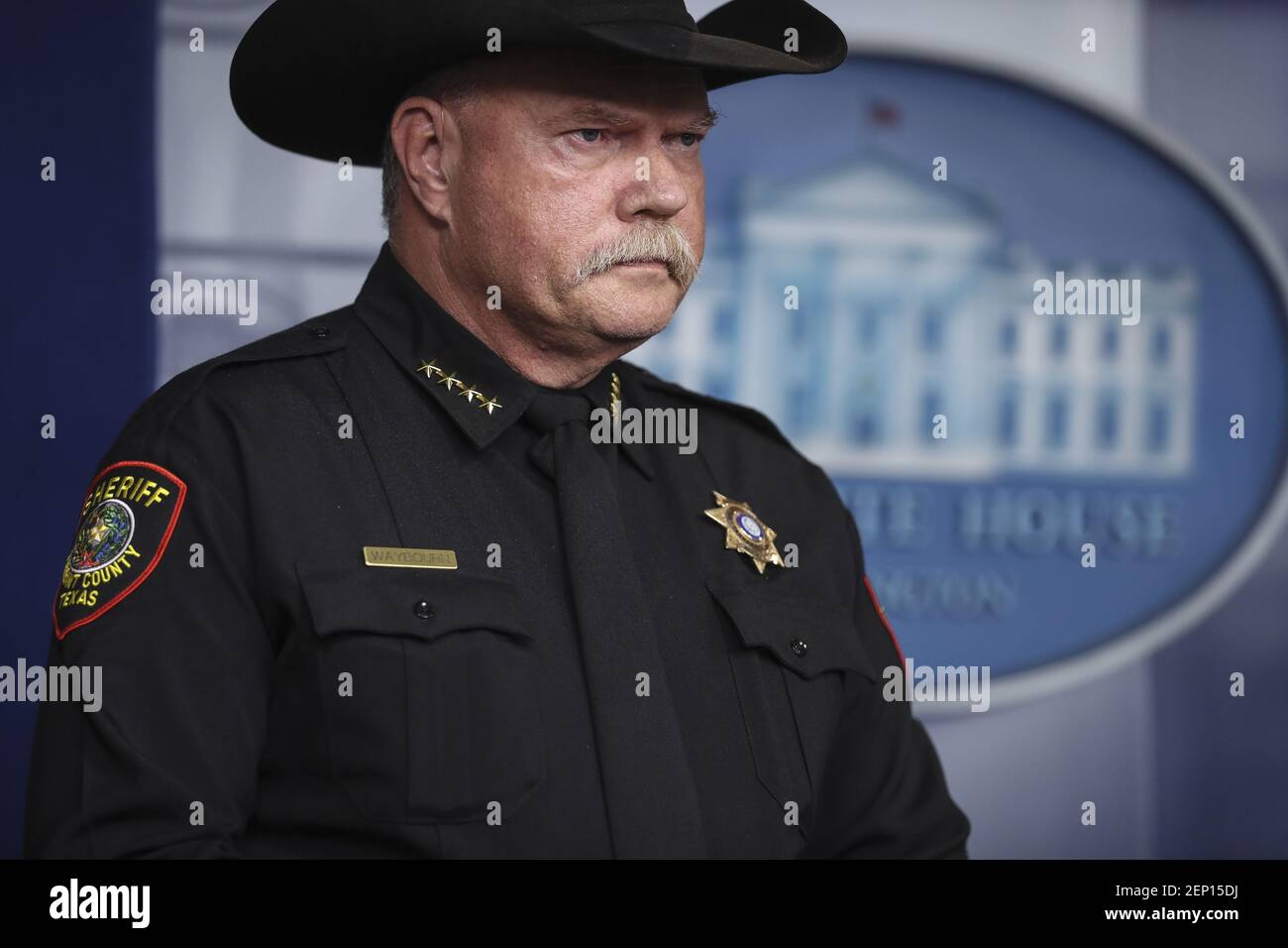 Tarrant County, Texas Sheriff Bill Waybourn listens during a White ...