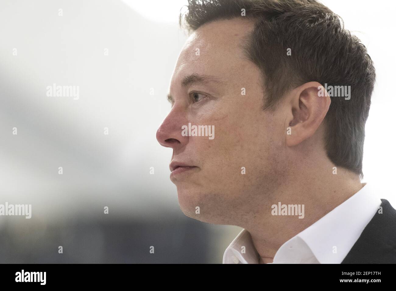 SpaceX Chief Engineer Elon Musk speaks to media in front of Crew Dragon ...