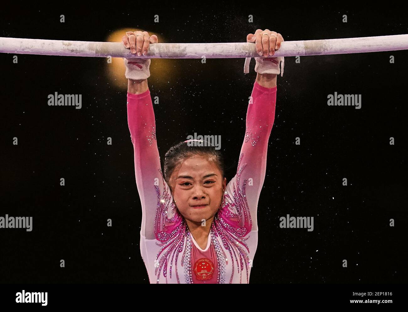 Shijia Li of China competing in uneven bars for women during the 49th ...