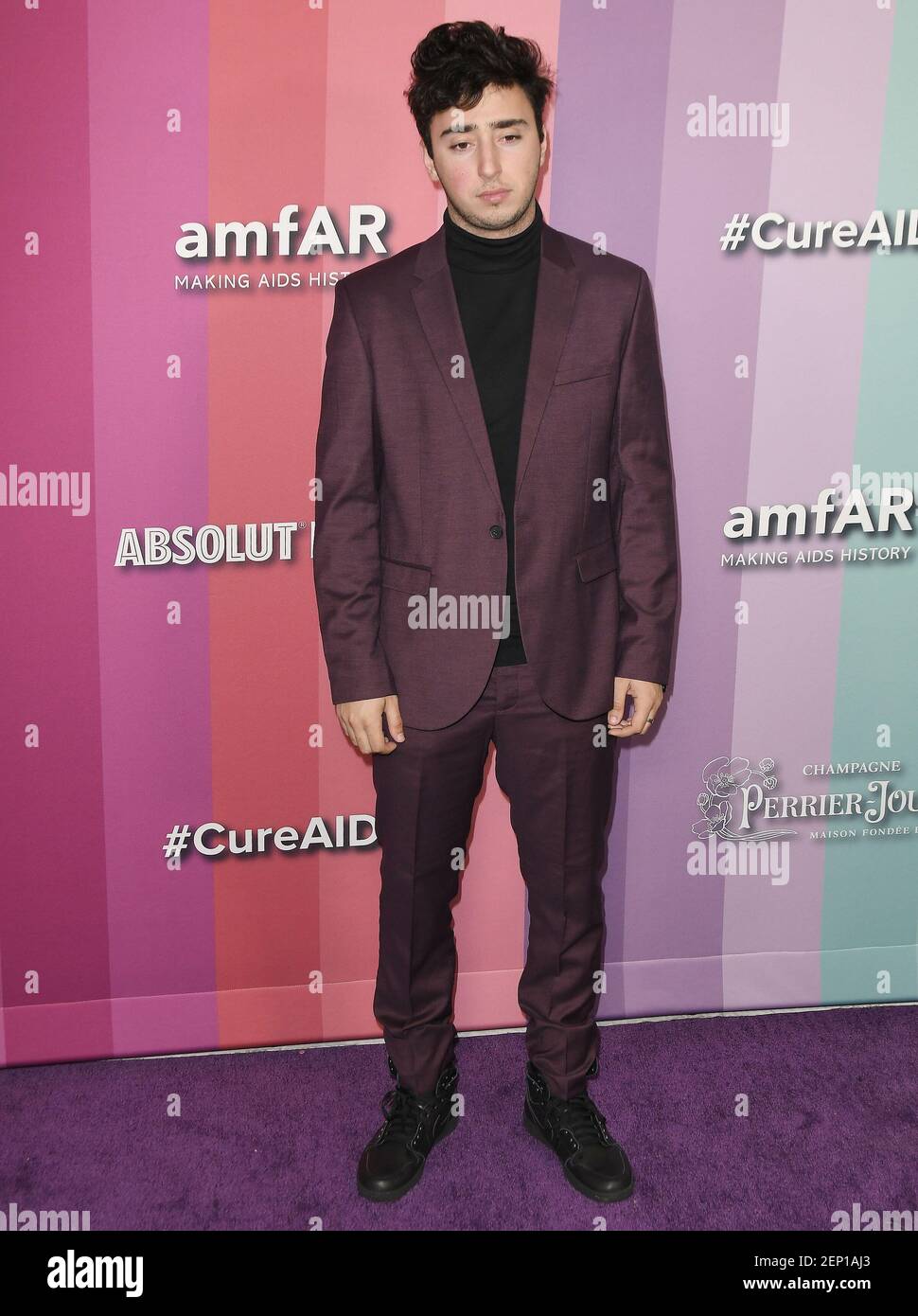 Zack Bia arrives at the 2019 amfAR Gala Los Angeles held at Milk ...