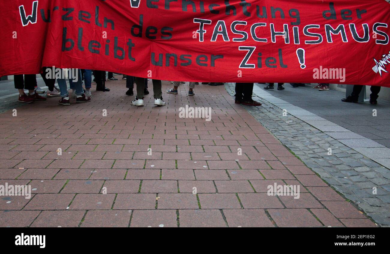 Protesters hold a banner during the demonstration. After the recent ...