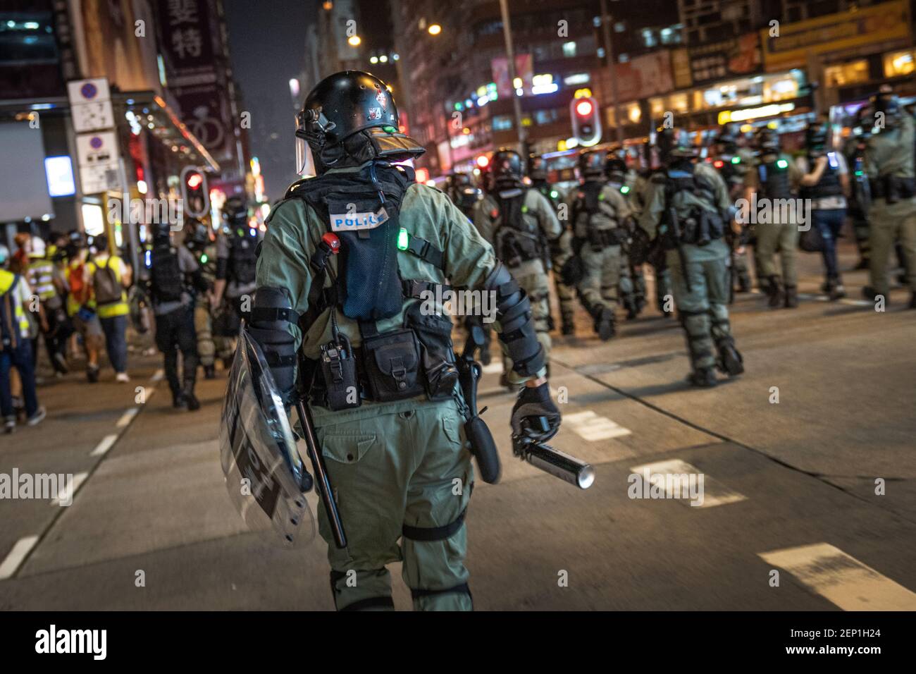 Hong Kong riot police disperse pro-democracy protesters in front of ...