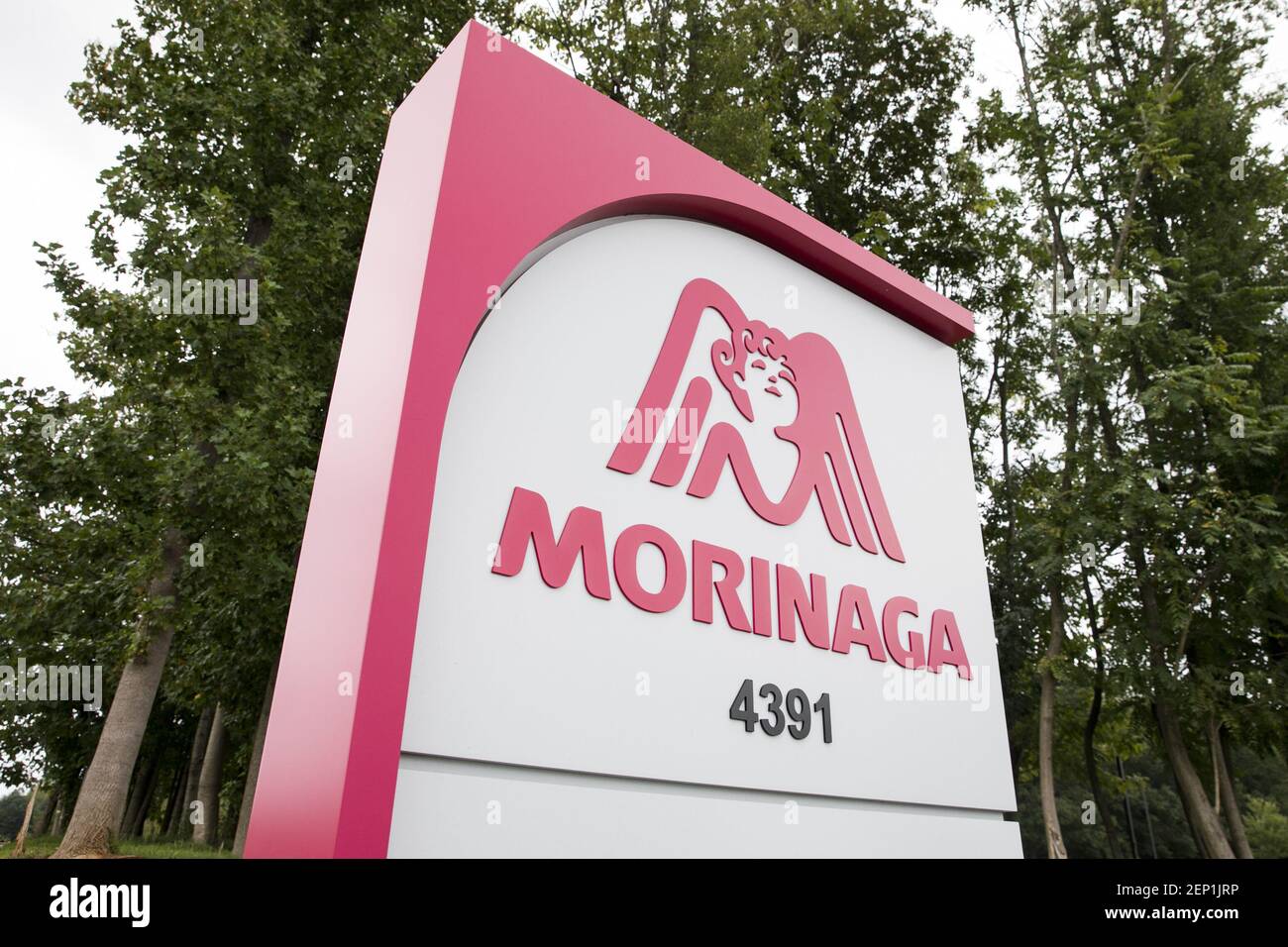A logo sign outside of a facility occupied by Morinaga & Company in ...