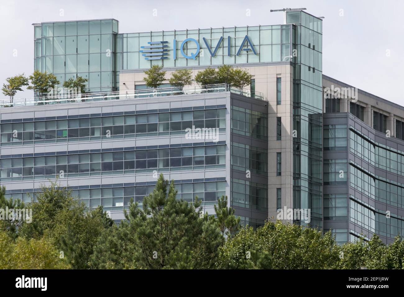 A logo sign outside of the headquarters of IQVIA in Durham, North ...