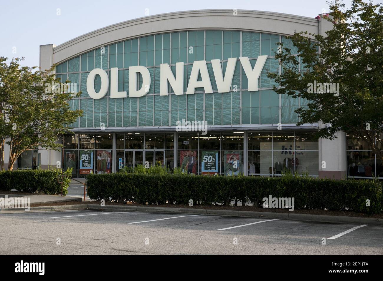 A logo sign outside of a Old Navy retail store location in Greensboro ...