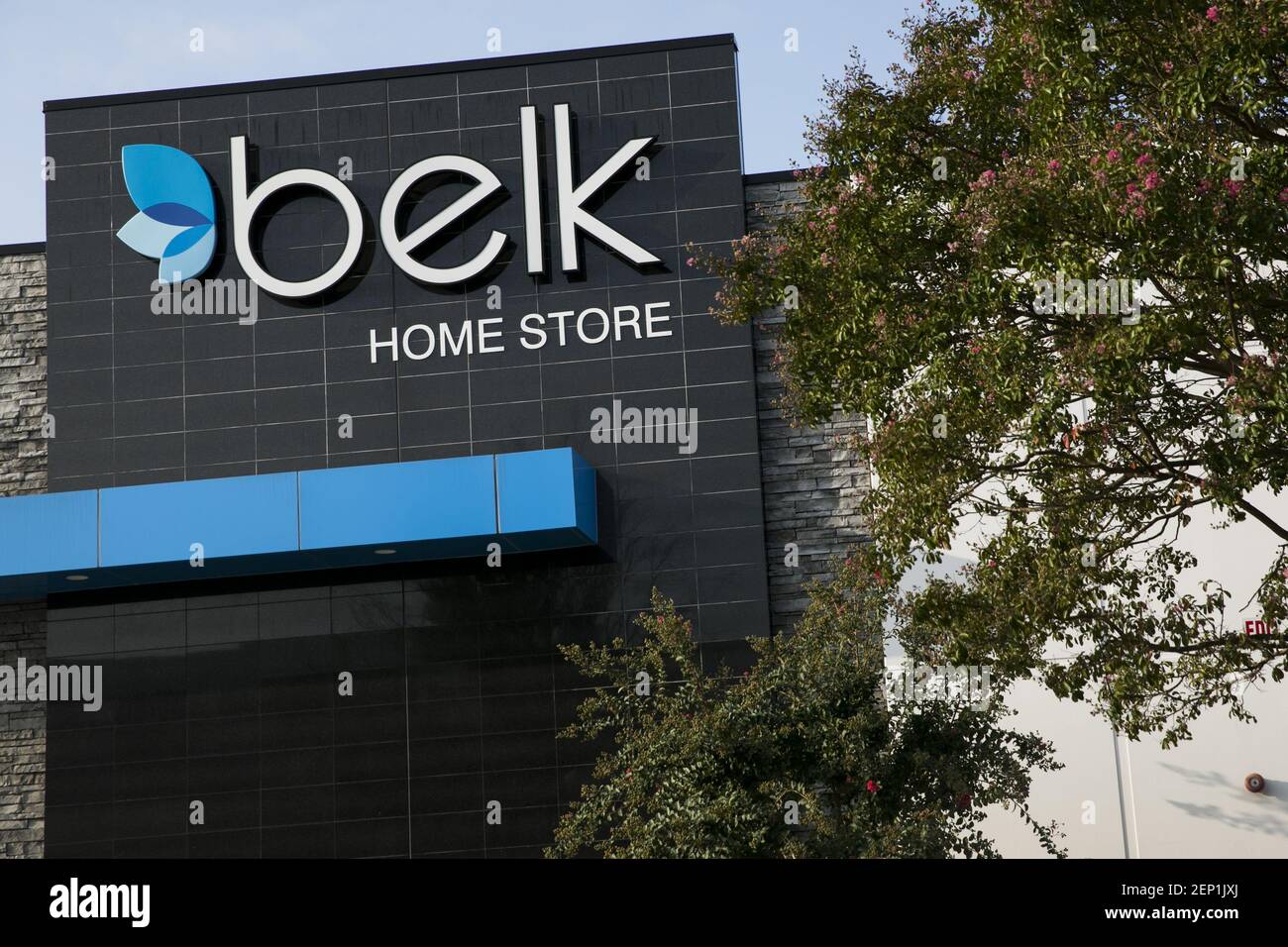 A logo sign outside of a Belk Home Store location in Greensboro, North ...