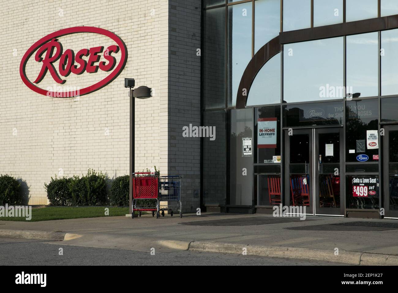 A logo sign outside of a Roses retail store location in Wilson, North ...