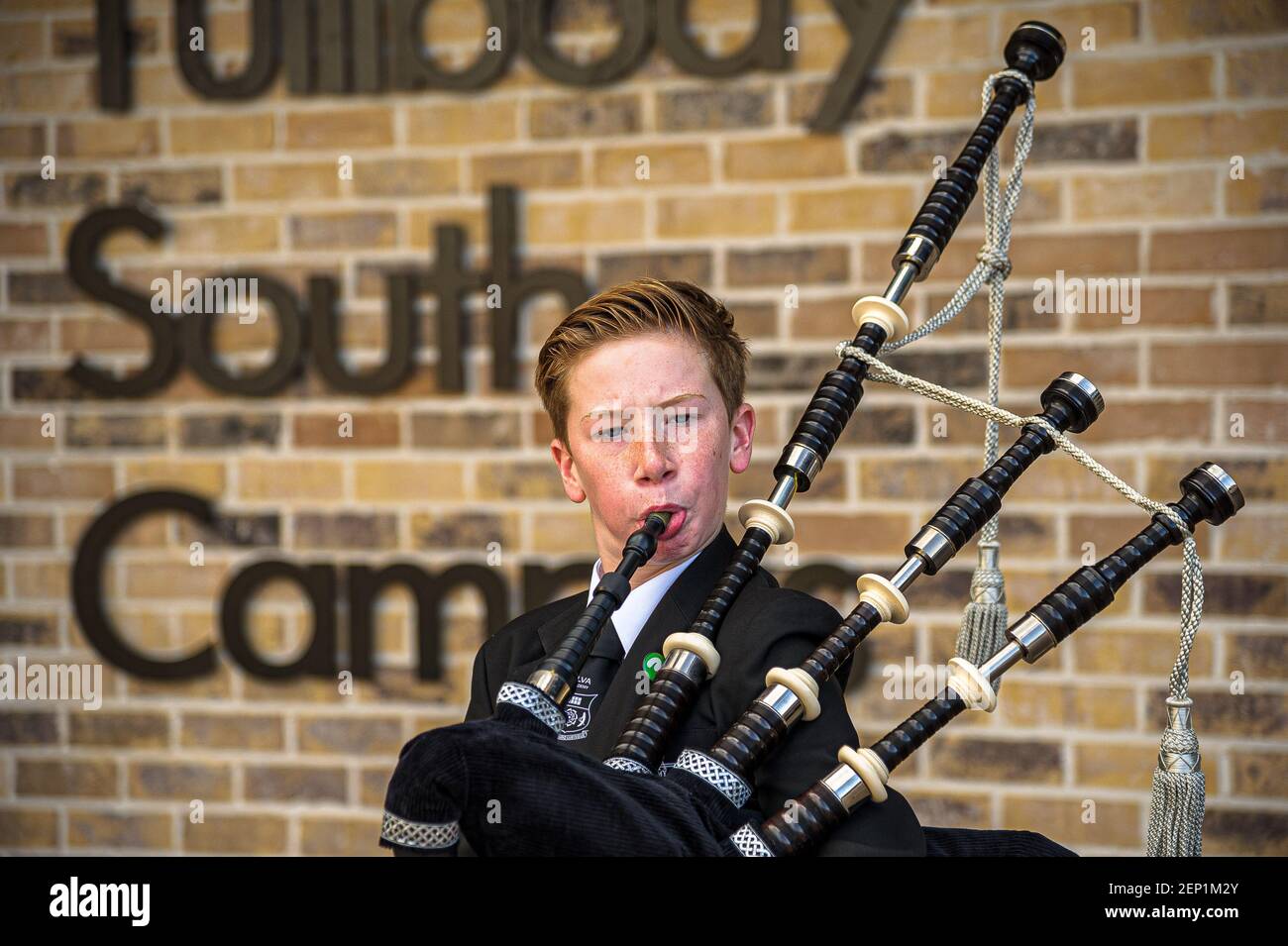 Alva Academy piper, Finley Rowe is seen playing outside of the main ...