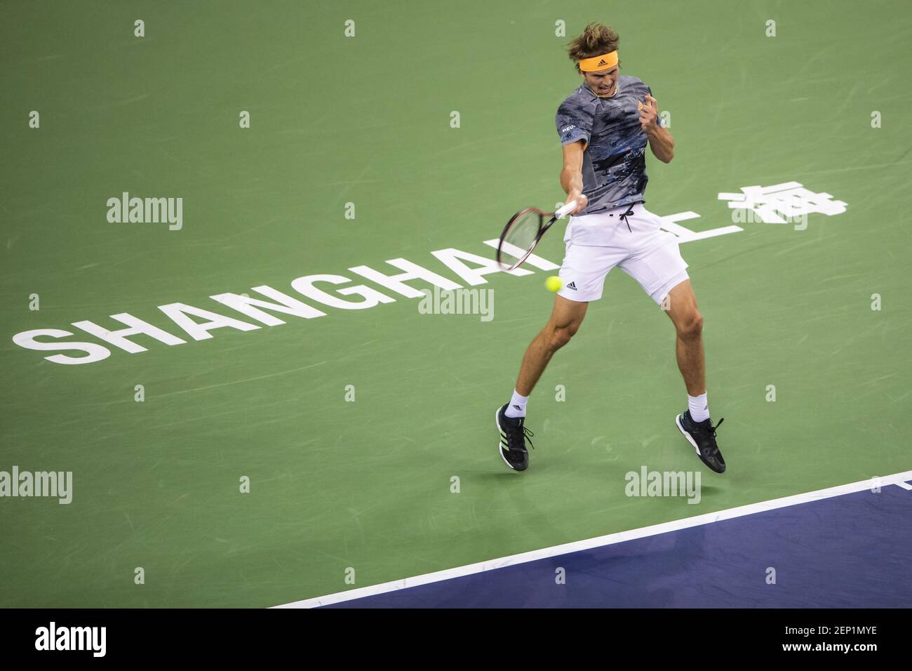 Alexander Zverev of Germany gets the ball against Daniil Medvedev of ...