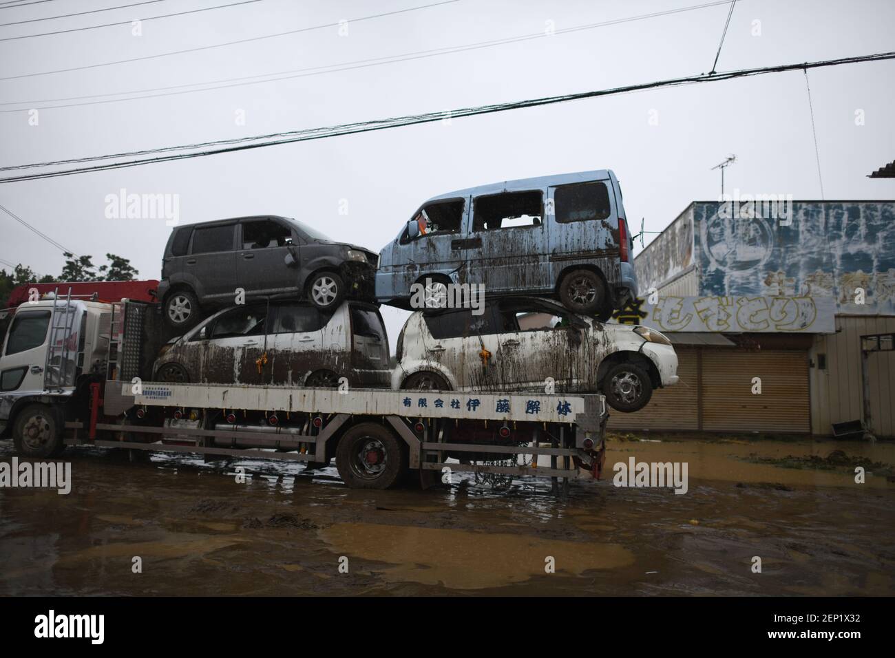 NAGANO, JAPAN - OCTOBER 14: Damage cars by typhoon loaded in the truck ...
