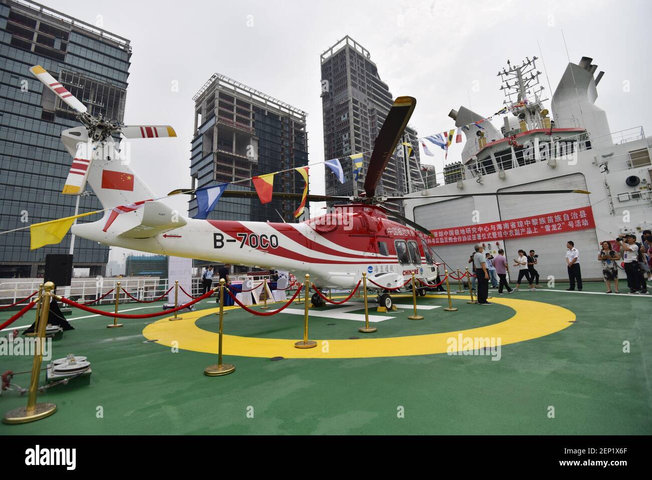 Local citizens visit the Xue Long 2 at Shekou Cruise Center in Shenzhen ...