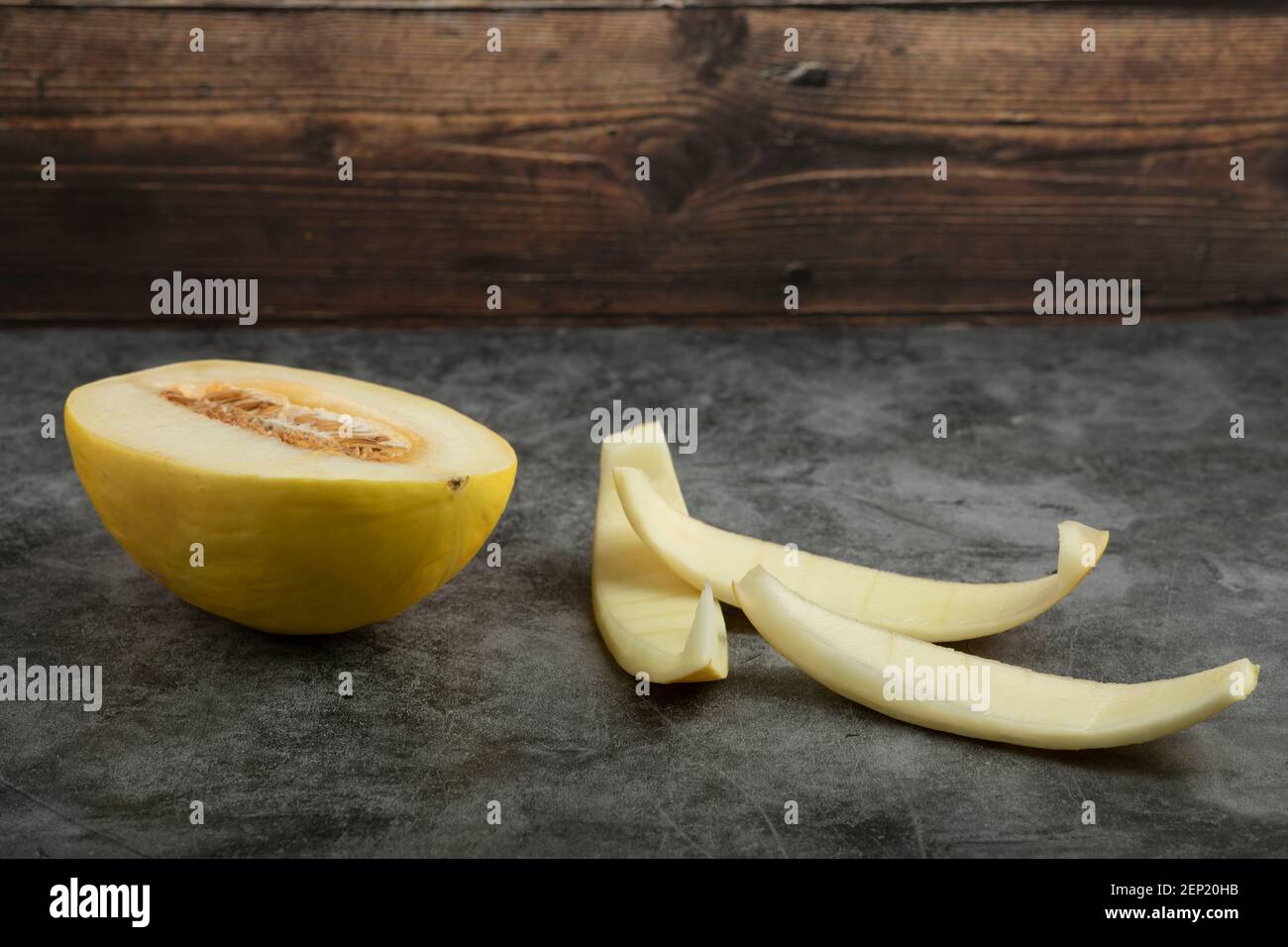 Set of fresh sweet melon placed on marble surface Stock Photo - Alamy