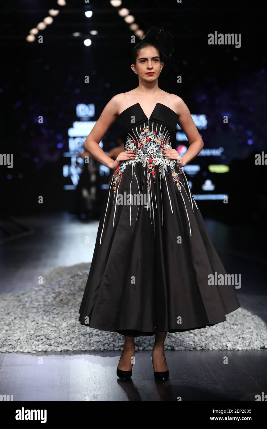 NEW DELHI, INDIA - OCTOBER 9: A model showcases a creation of fashion ...