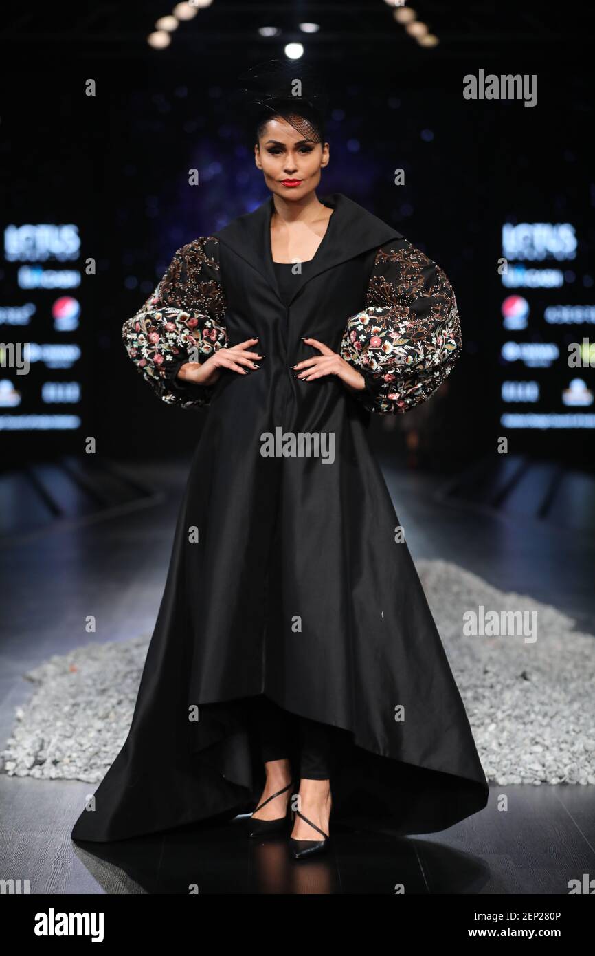 NEW DELHI, INDIA - OCTOBER 9: A model showcases a creation of fashion ...