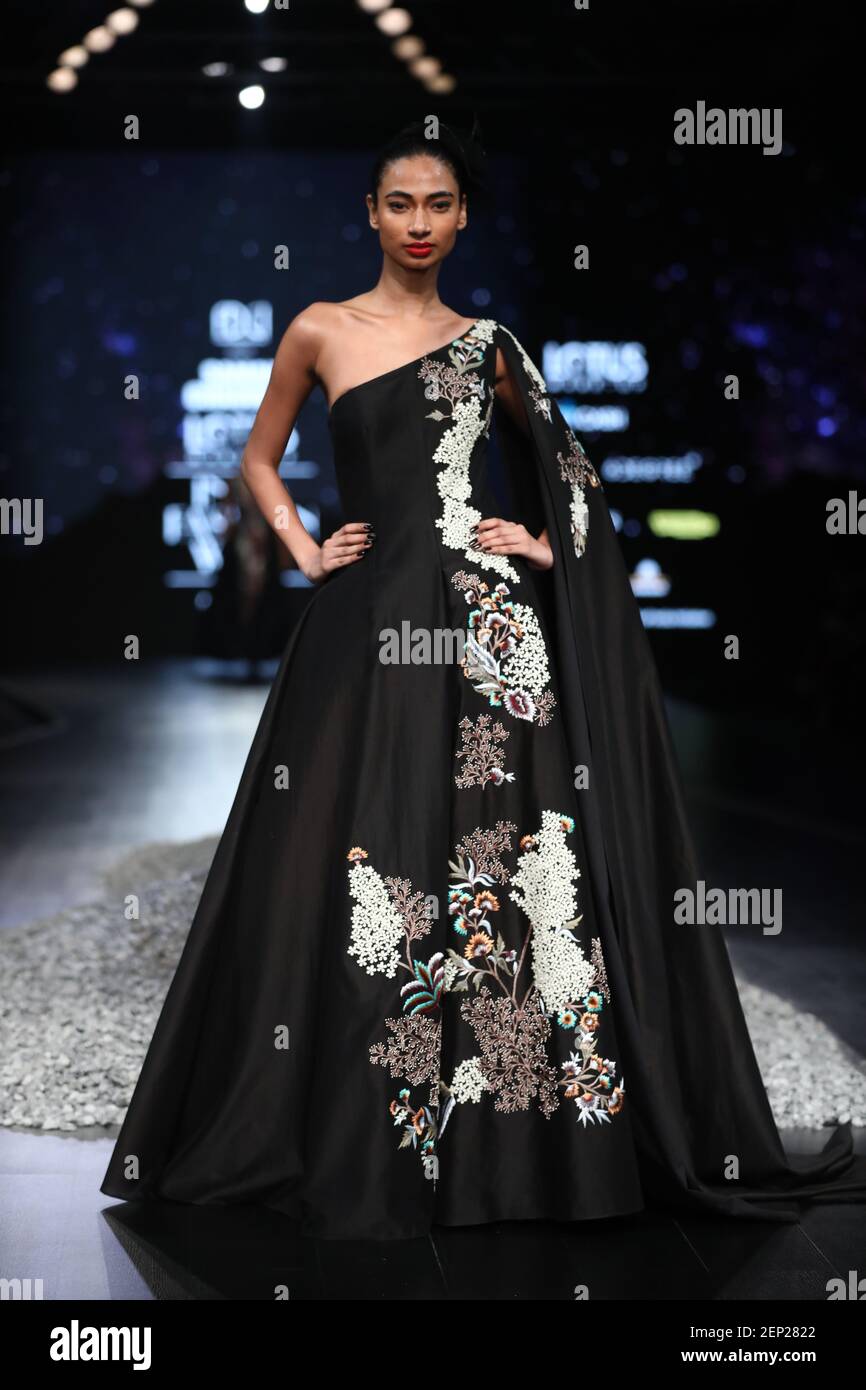 NEW DELHI, INDIA - OCTOBER 9: A model showcases a creation of fashion ...