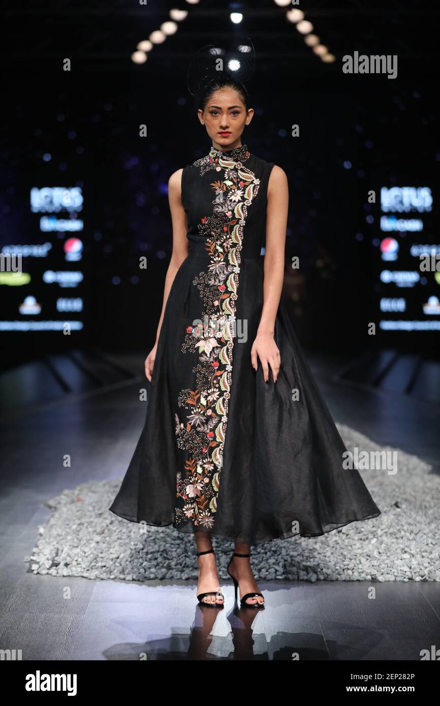 NEW DELHI, INDIA - OCTOBER 9: A model showcases a creation of fashion ...