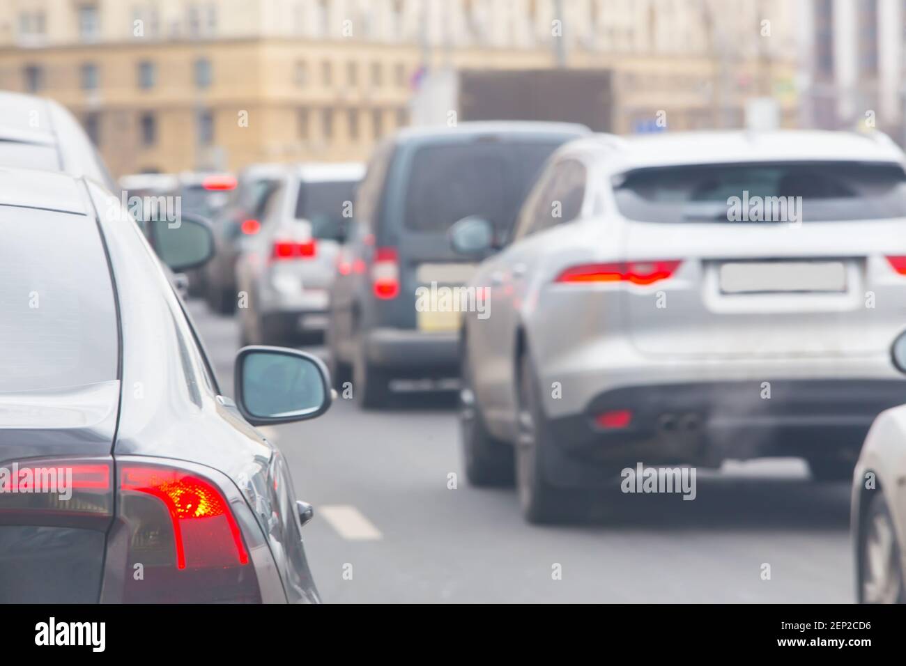 car in a big traffic jam. Back view. Blurred background Stock Photo - Alamy