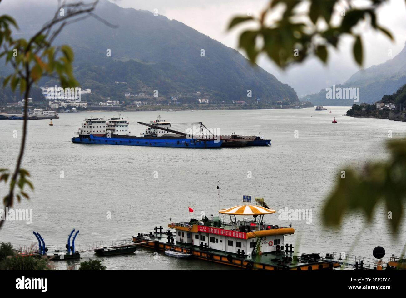 Vessels travel on the Yangtze River at Yiling district of Yichang city, central China's Hubei ...