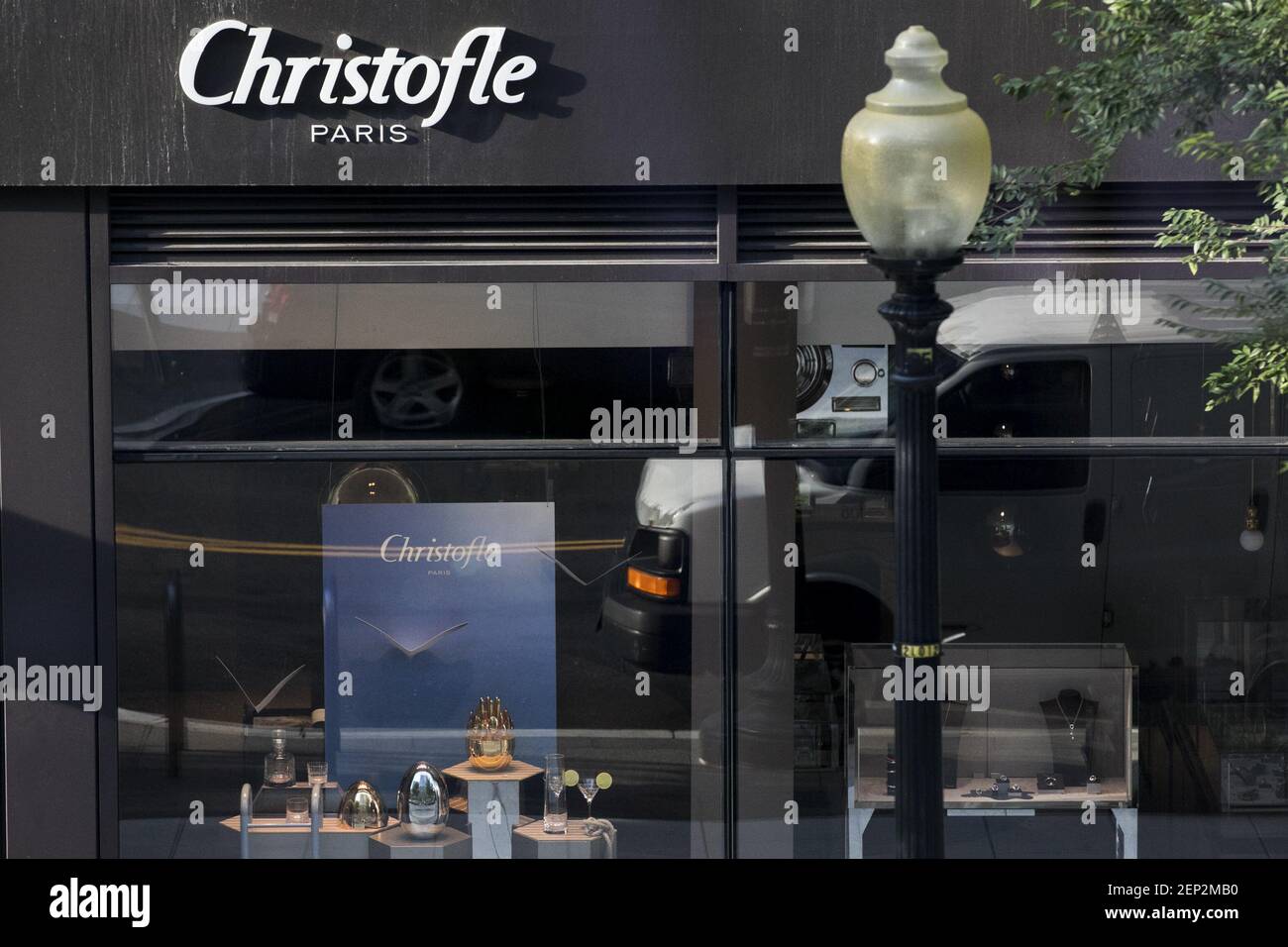 A logo sign outside of a Christofle retail store location in downtown ...