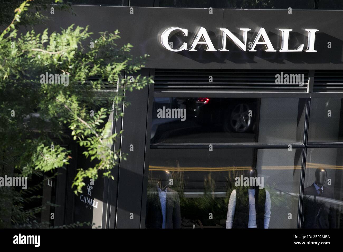 A logo sign outside of a Canali retail store location in downtown ...