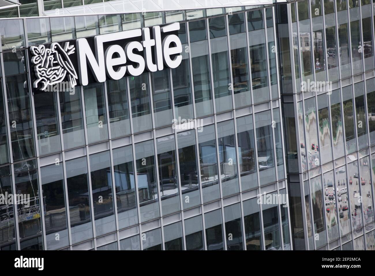 A logo sign outside of the headquarters of Nestle USA in Arlington ...