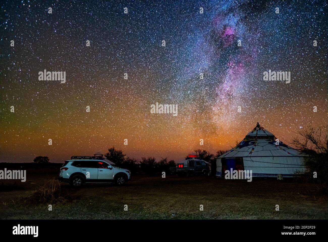 Night view of the Milky Way galaxy in the starry sky over Dalinor Lake in Hexigten Banner in ...