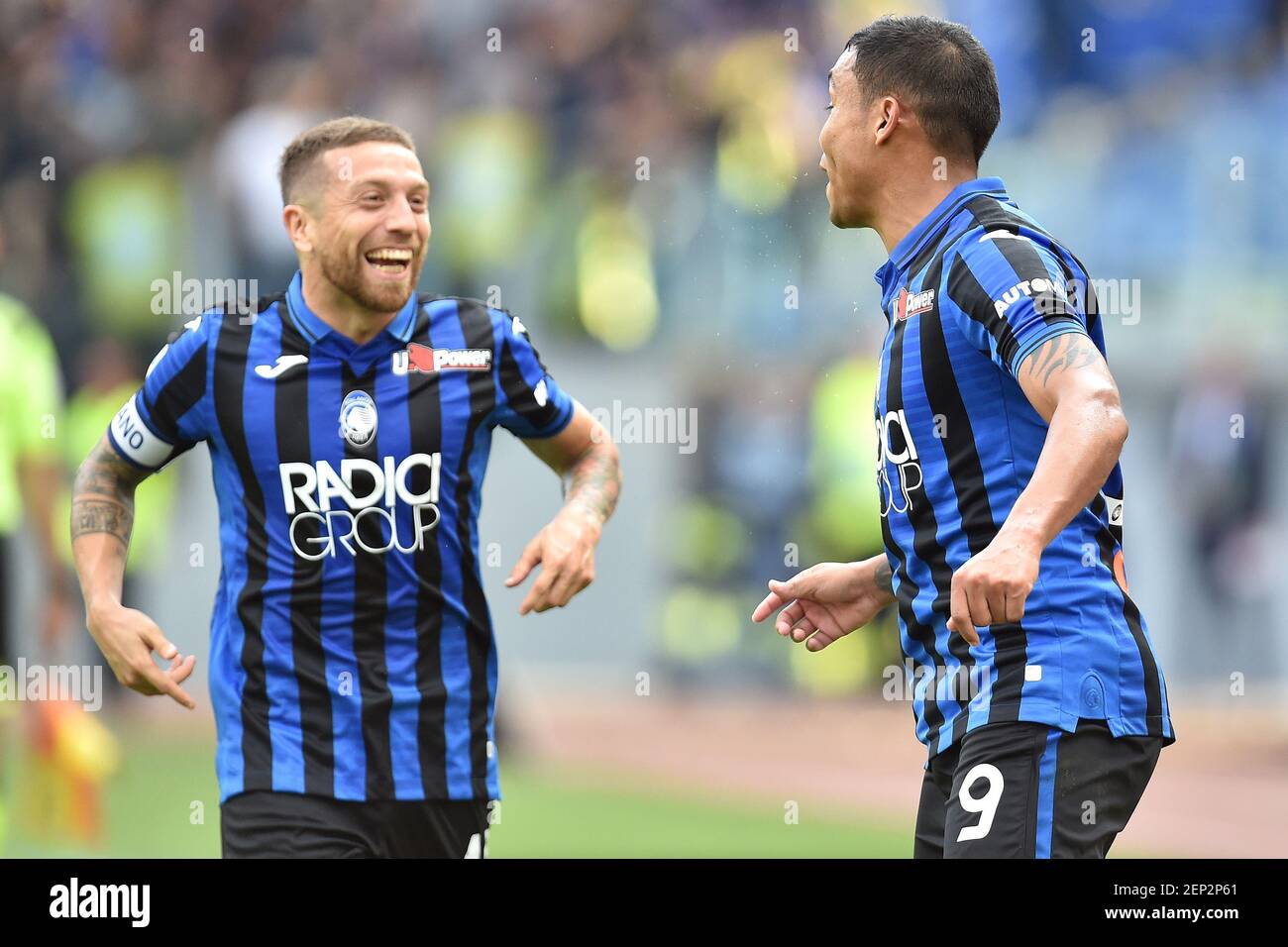 Luis Muriel of Atalanta BC (R) celebrates after scoring the goal of 0-2 ...
