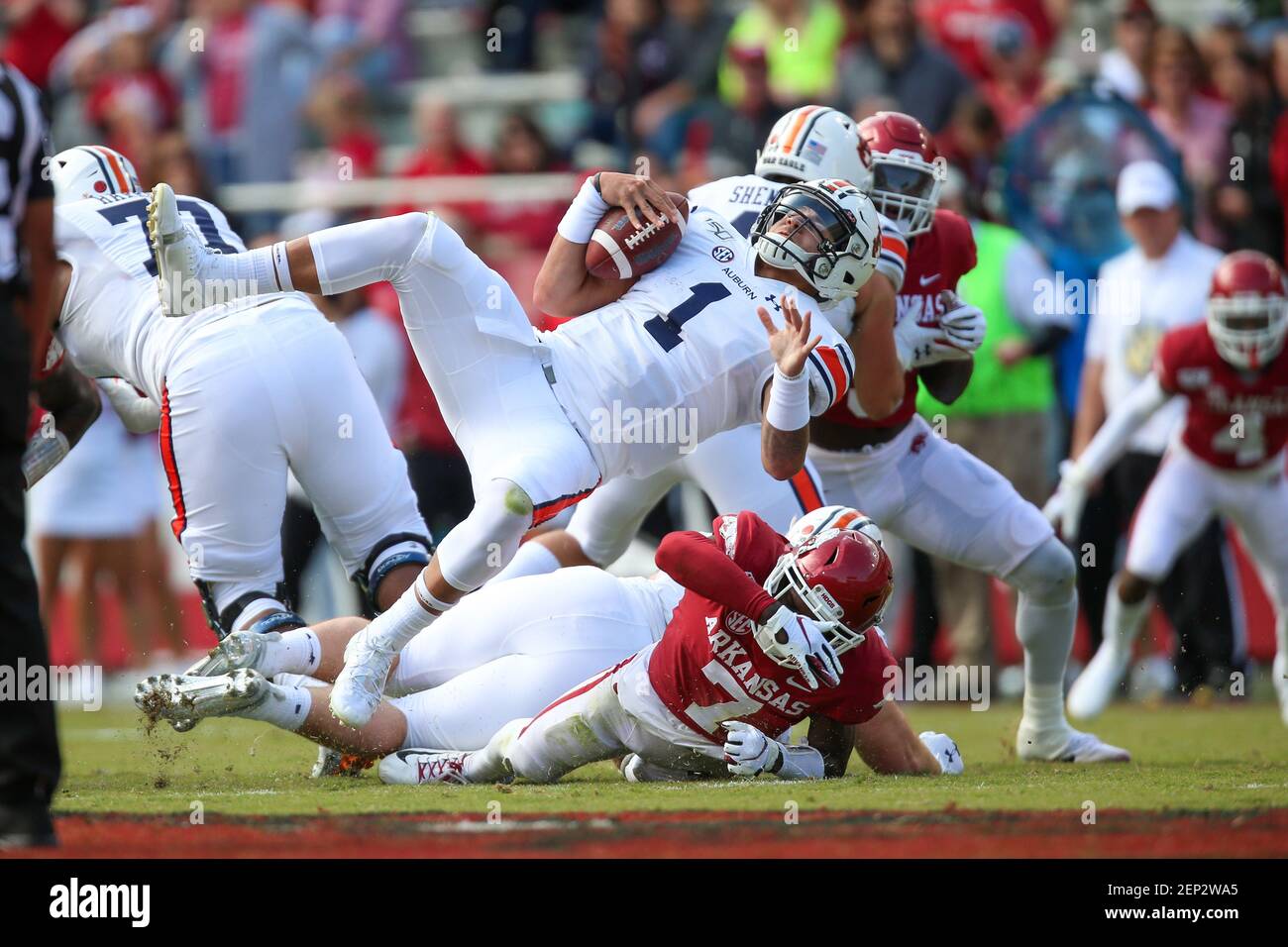 October 19, 2019: Arkansas defender Joe Foucha #7 flips up Auburn QB ...