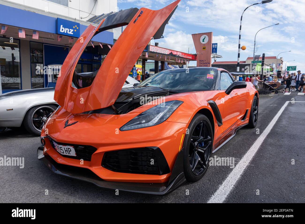 American classic and custom cars on display at an outdoor exhibition ...