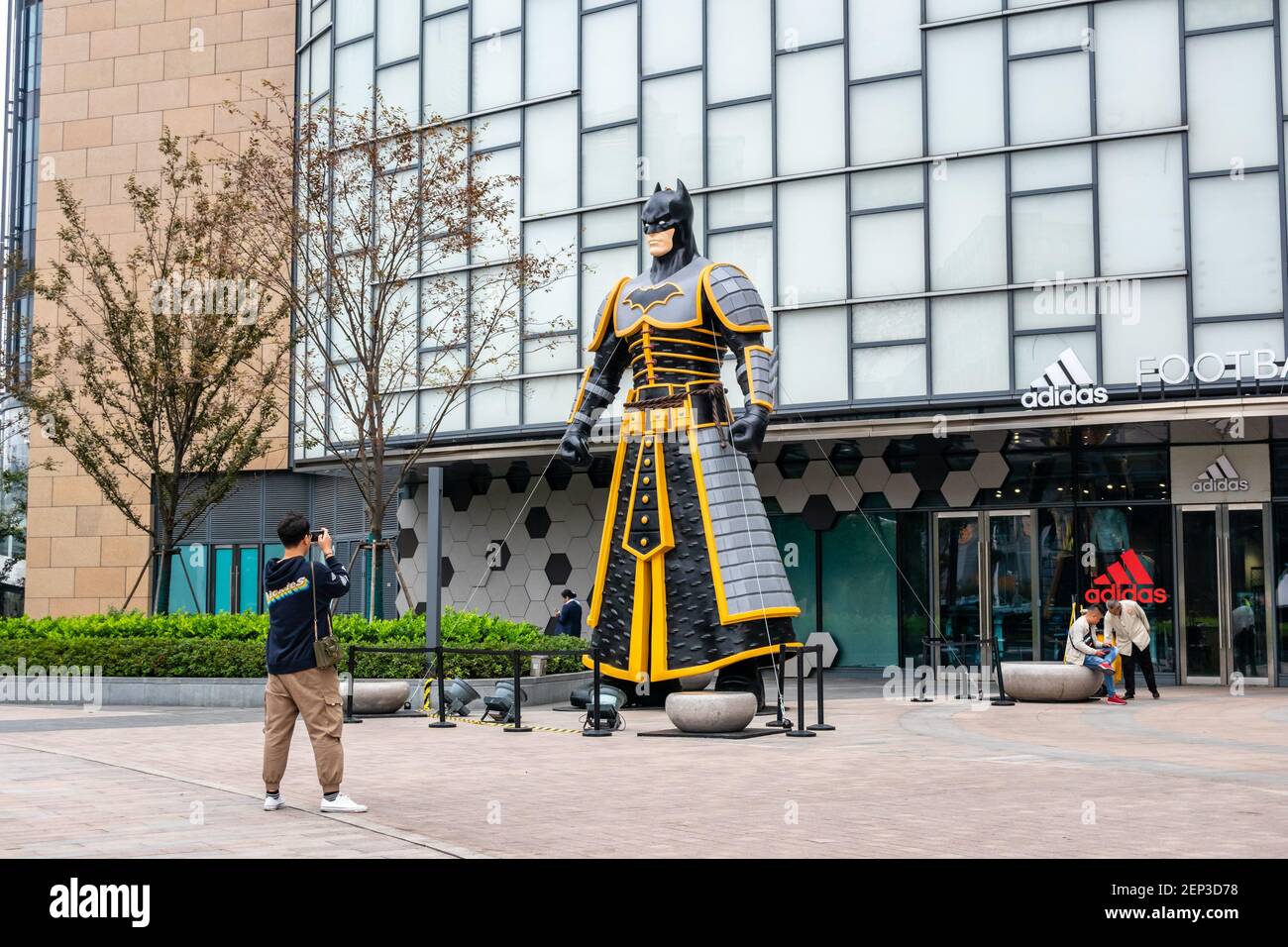 An eight-meter-high sculpture of fictional superhero Batman appears to ...