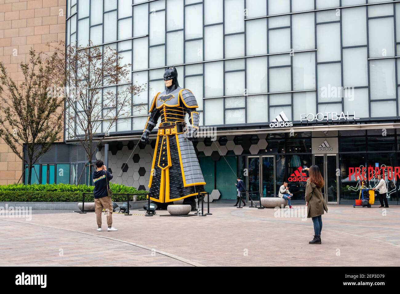 An eight-meter-high sculpture of fictional superhero Batman appears to ...