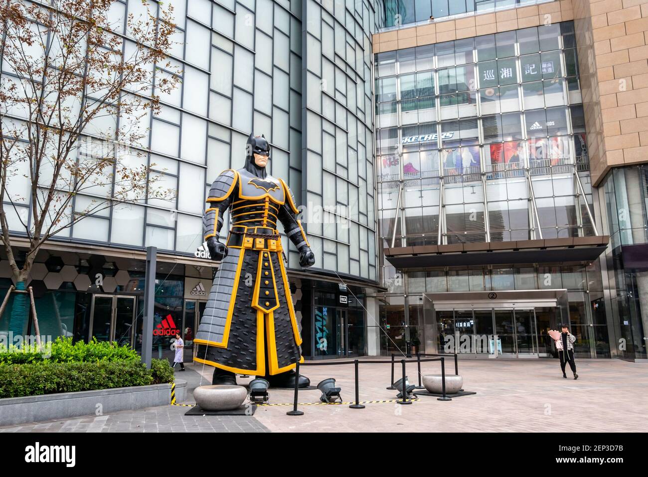 An eight-meter-high sculpture of fictional superhero Batman appears to ...