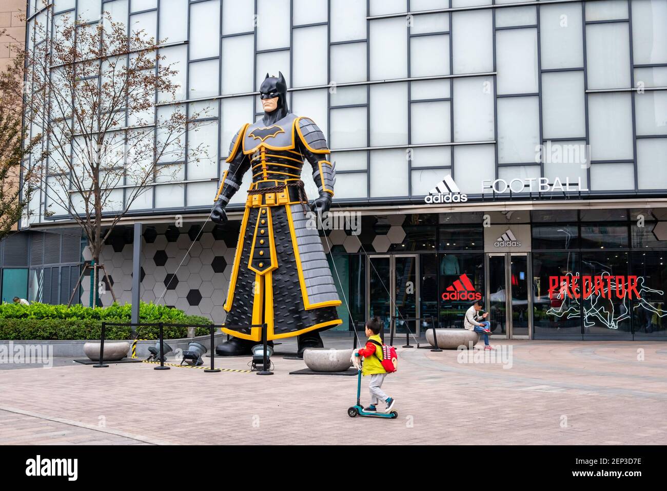 An eight-meter-high sculpture of fictional superhero Batman appears to ...
