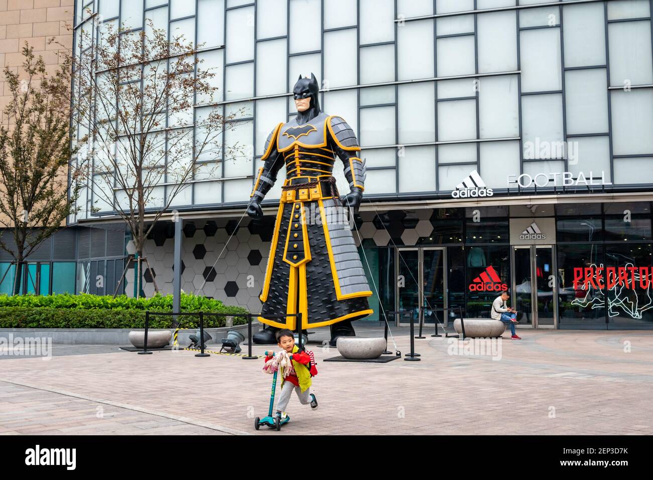 An eight-meter-high sculpture of fictional superhero Batman appears to ...