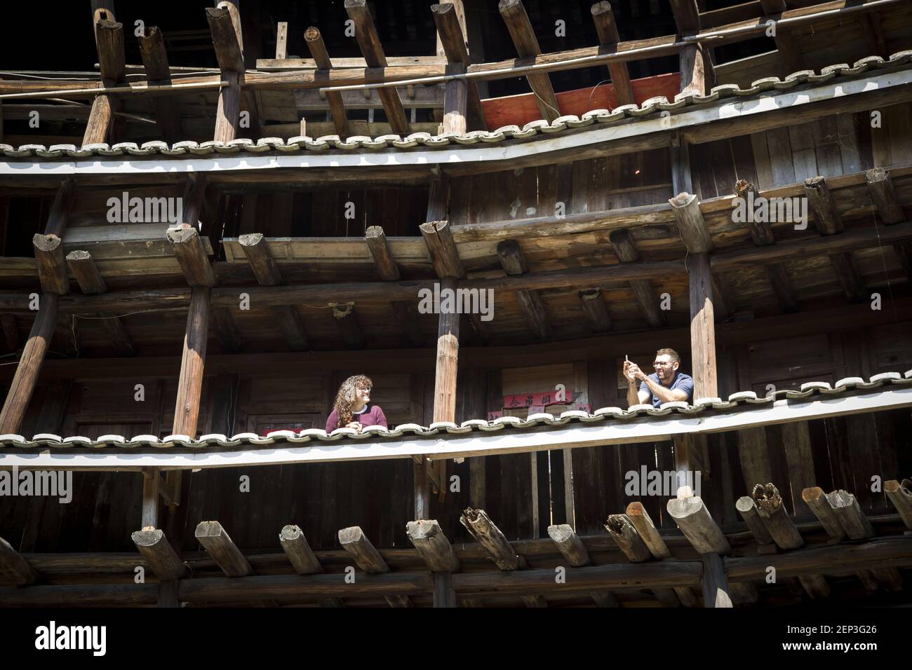 The inside view of inclined pillars and rooms of Yuchang building in ...