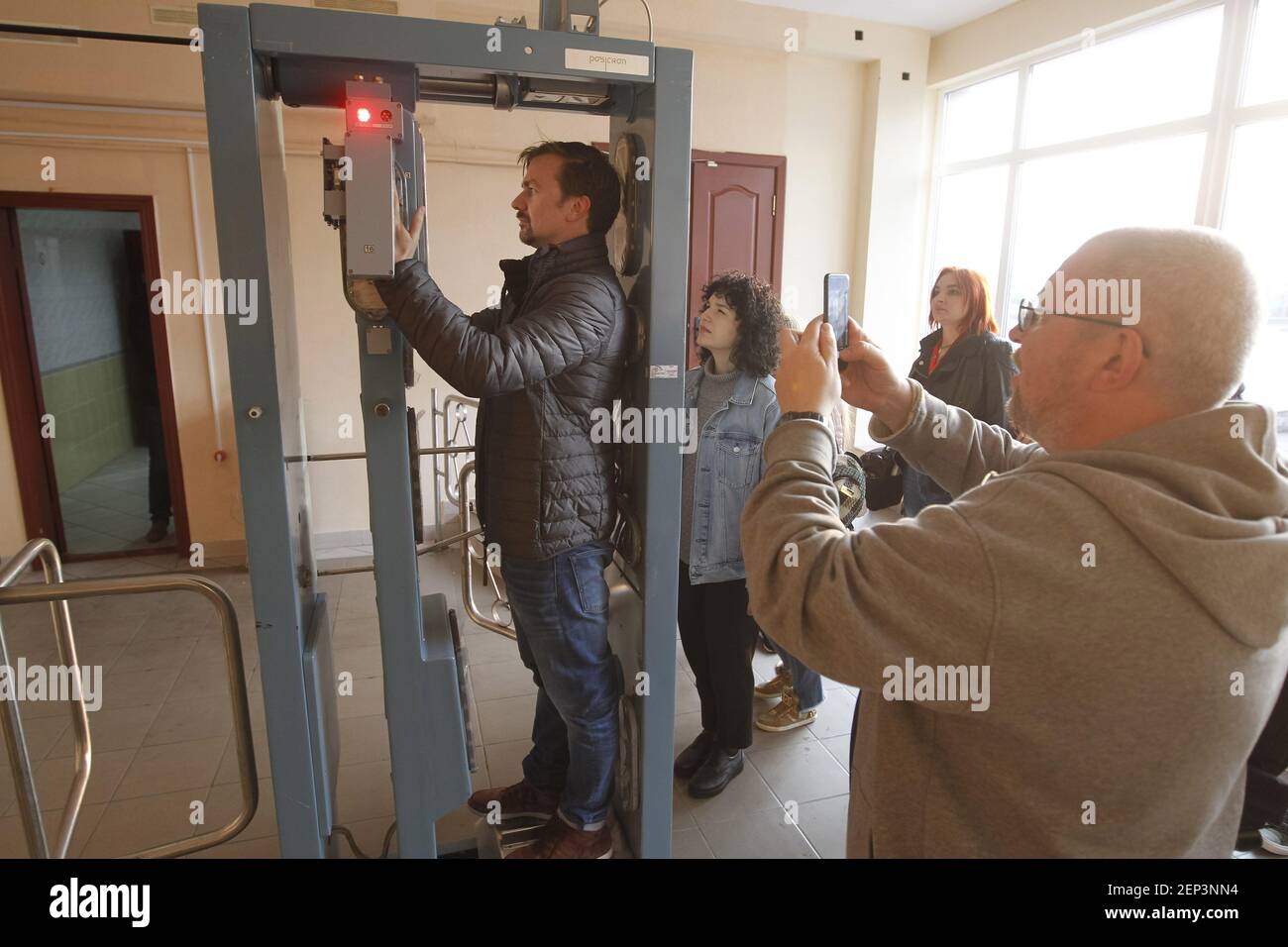 Visitors measure radiation level at the Chernobyl Nuclear Power Plant ...