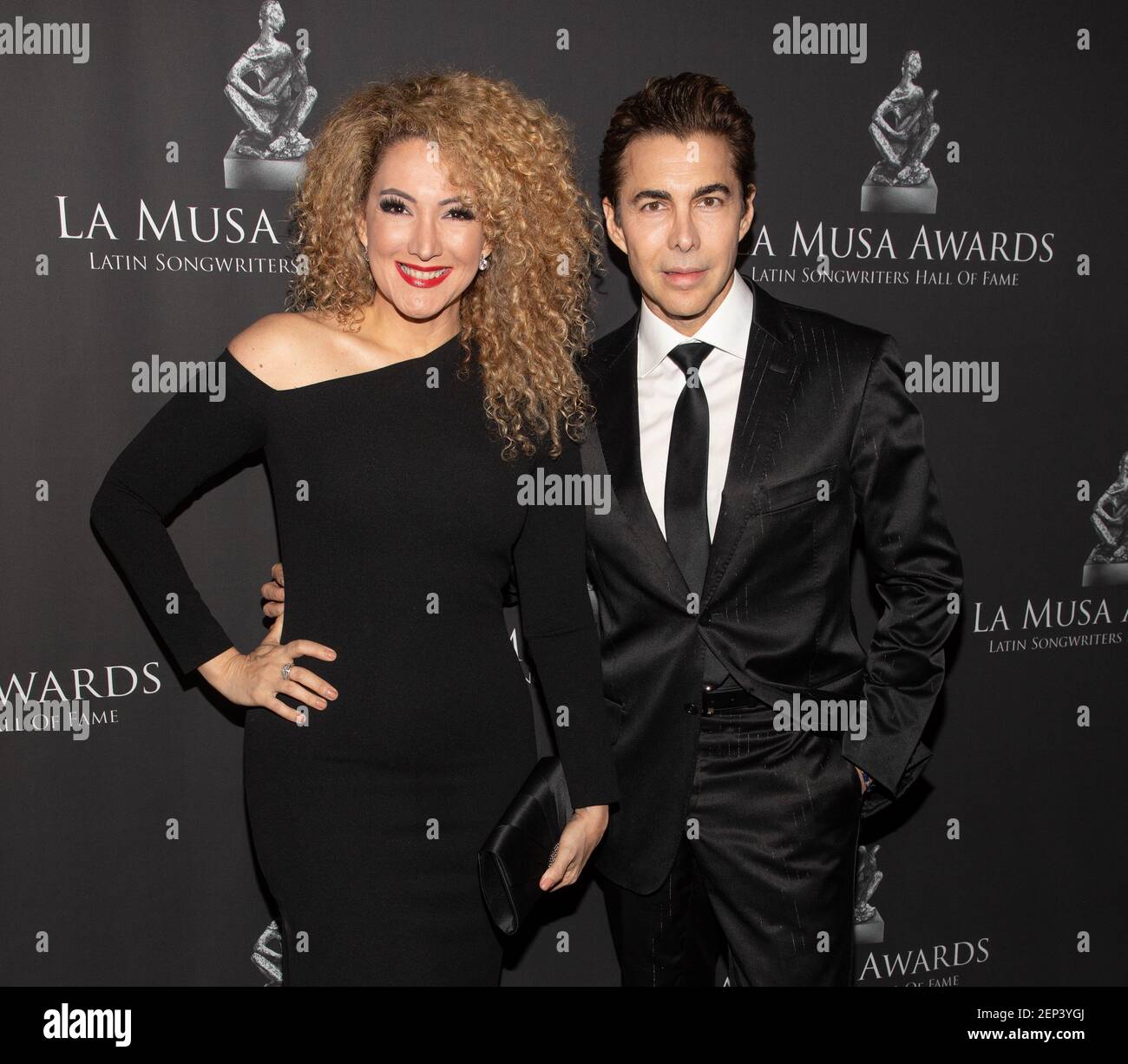 MIAMI, FL - OCT 24: Erika Ender and designer Nicolas Felizola are seen ...