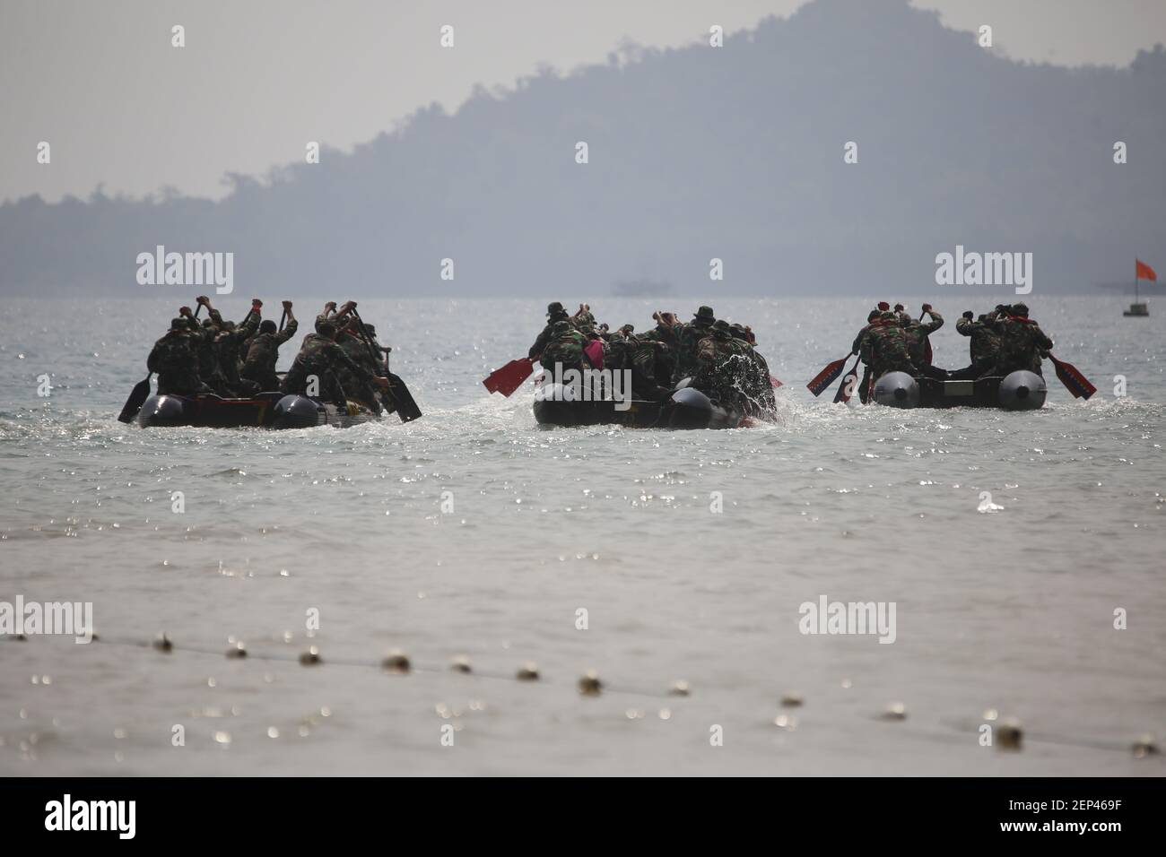 Indonesian Marines take part in the rowing competition on the 74th ...