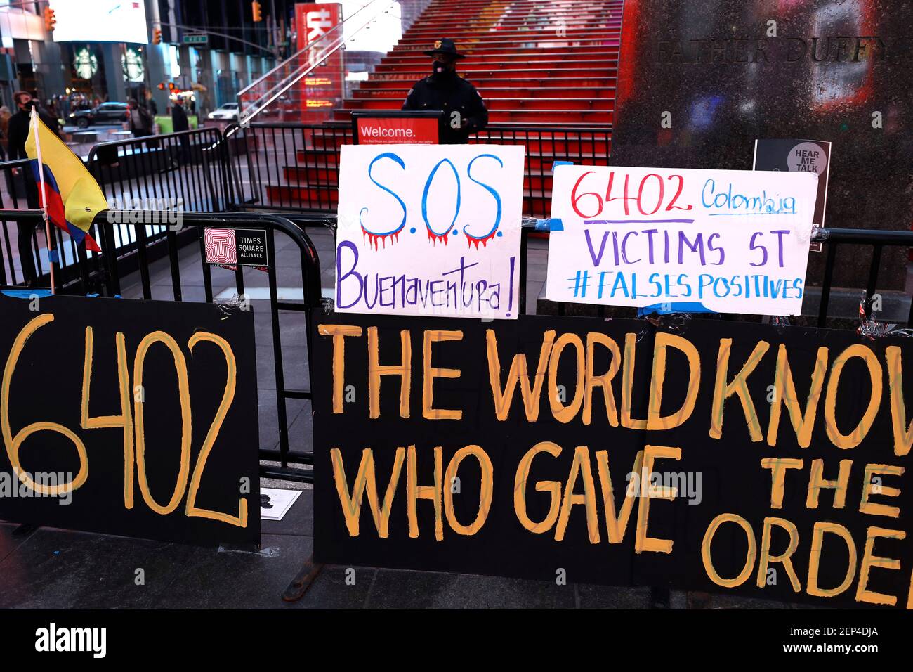 Placards showing the number '6402' are laid out in Times Square. The ...