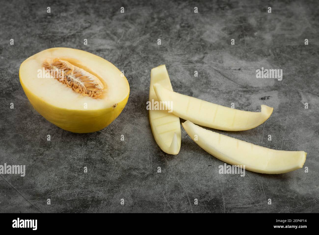 Set of fresh sweet melon placed on marble surface Stock Photo - Alamy