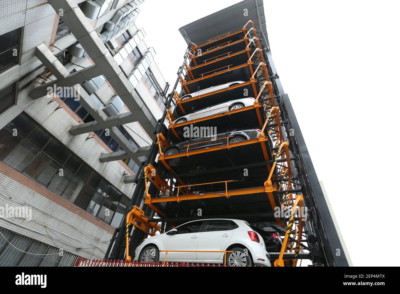 A multi-storey car park, which extends to the sky and contains 40 more ...