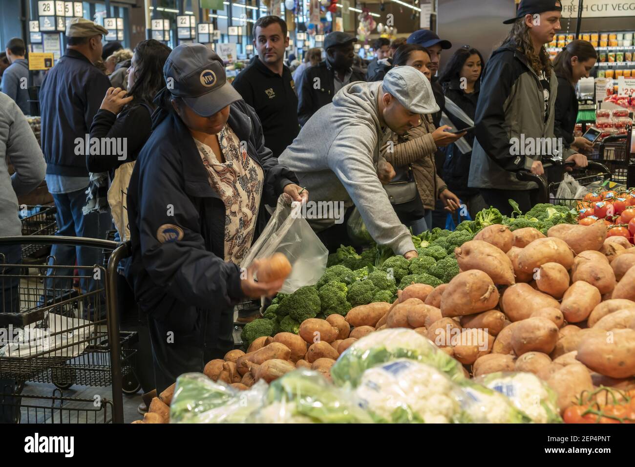Thousands of excited shoppers flock to the Wegmans supermarket in ...
