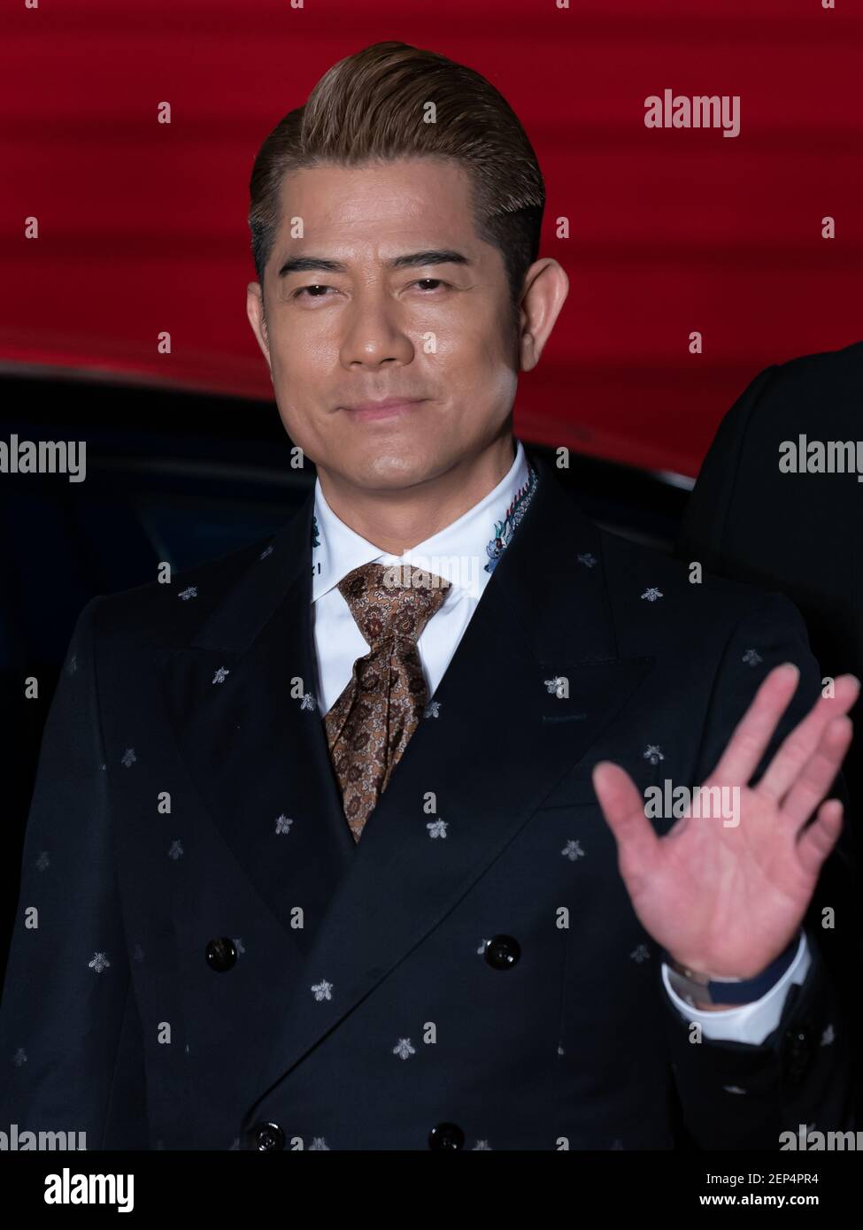 Hong Kong singer and actor Aaron Kwok arrives at the opening ceremony ...