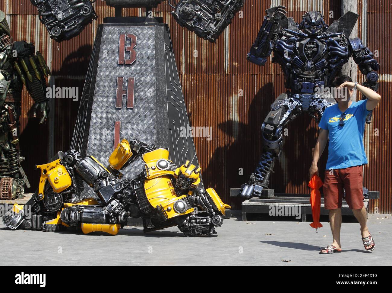 A man visits Ban Hun Lek, a metalwork shop renowned for giant statues ...