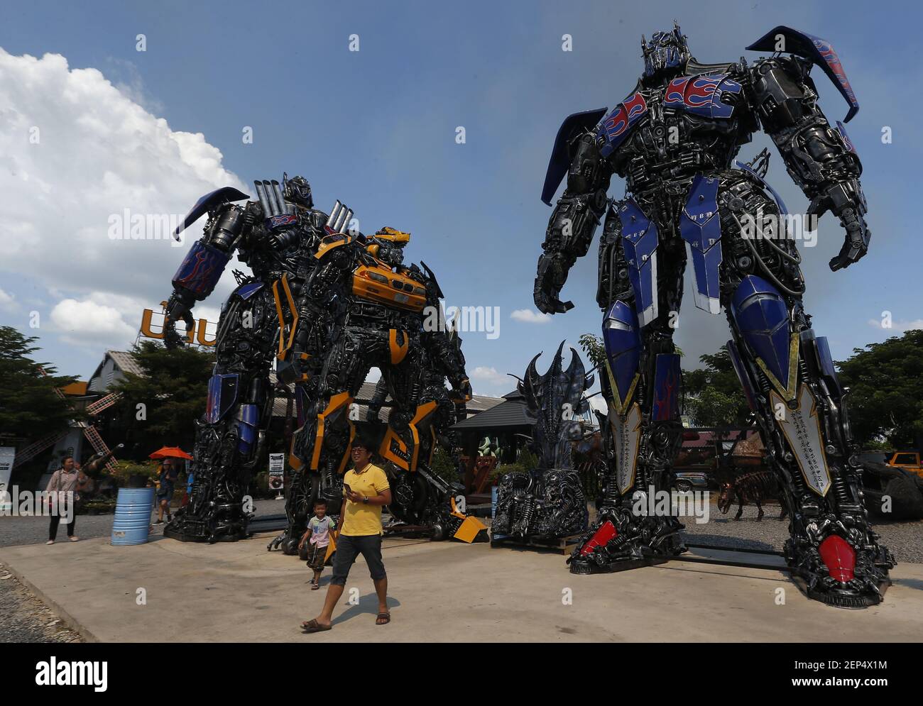 People visit Ban Hun Lek, a metalwork shop renowned for giant statues ...