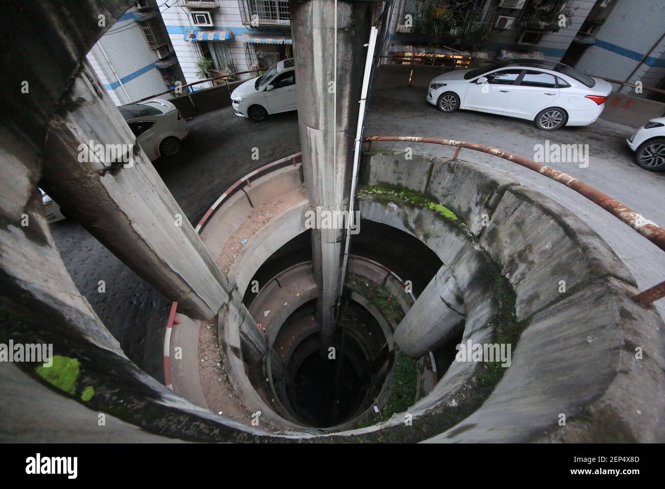 A car drives in the spiral parking lot in Chongqing, China, 27 October ...