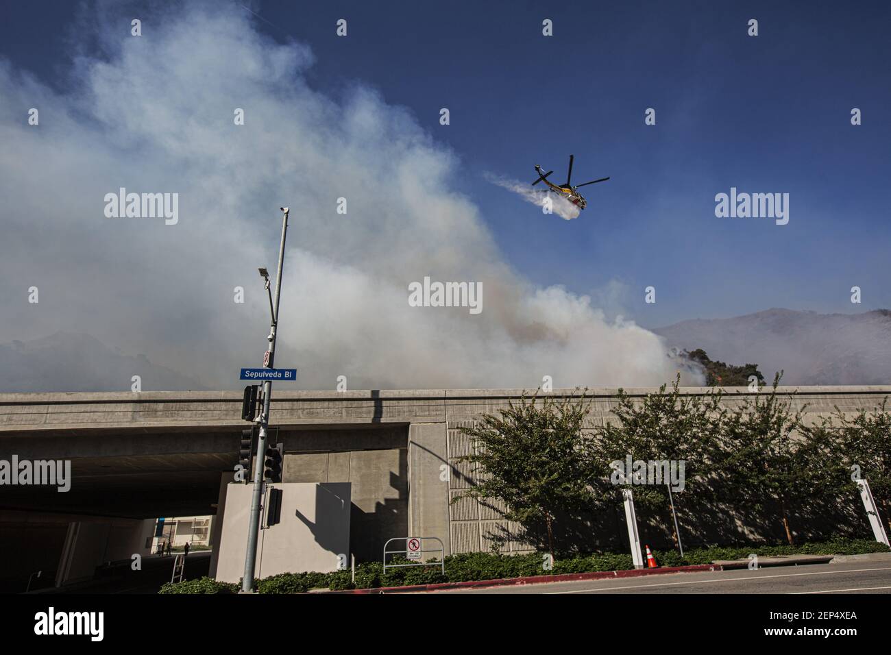 Getty Fire Burns in Los Angeles. A small brush fire burns in the hills ...
